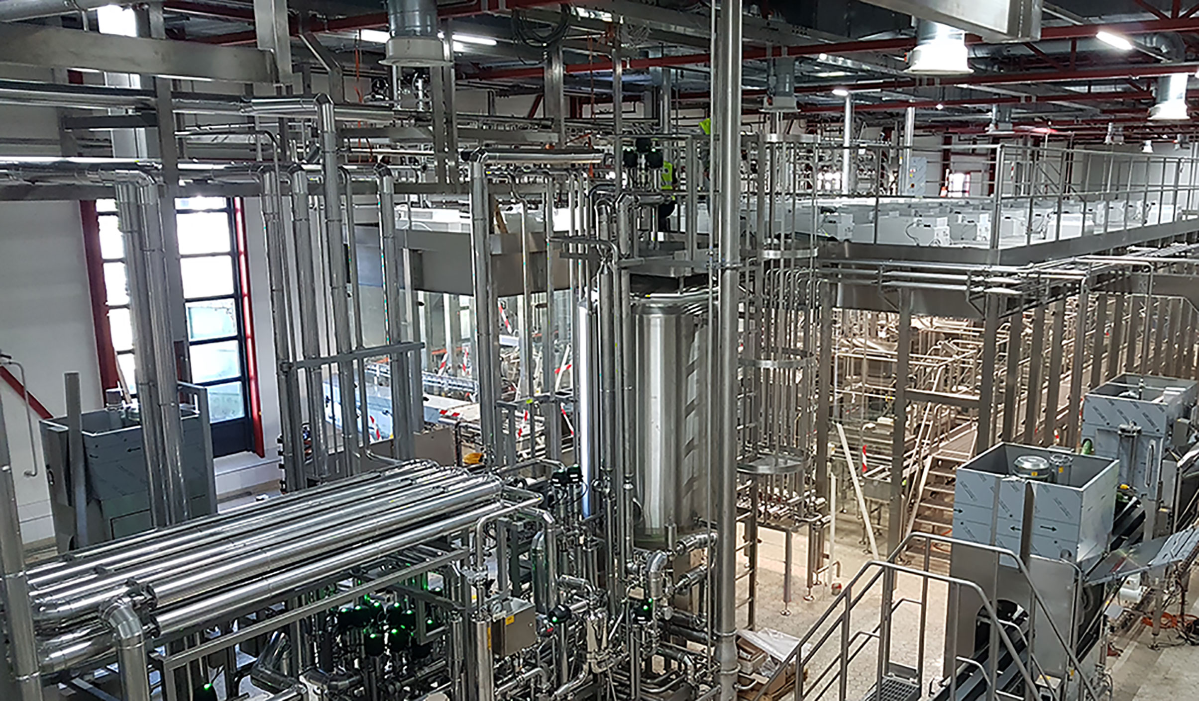 Systèmes de remplissage boissons sur mesure : Comac les rend possibles - Co.Mac.